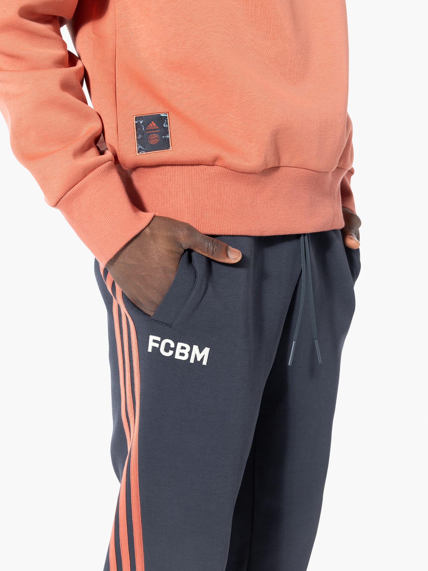 Men Hoodie FCBM orange | Official FC Bayern Munich Store